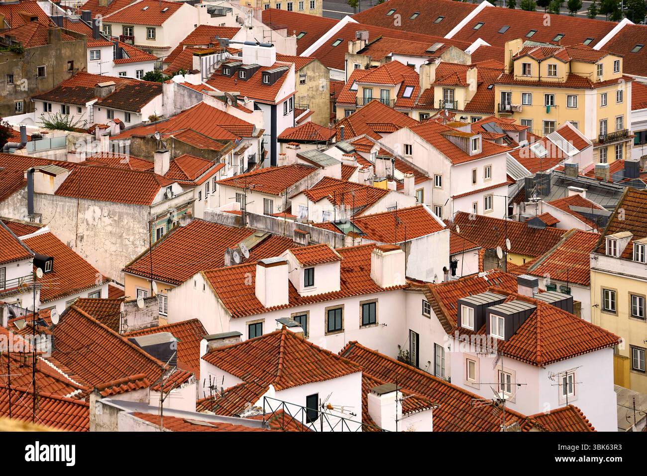 Lisbon, Portugal - 10 June 2025: View of the striking red roofs and ...