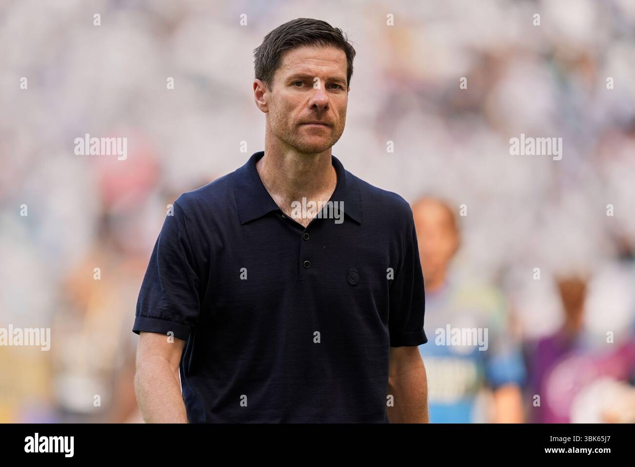 Real Madrid manager Xabi Alonso walks off the pitch at halftime during ...