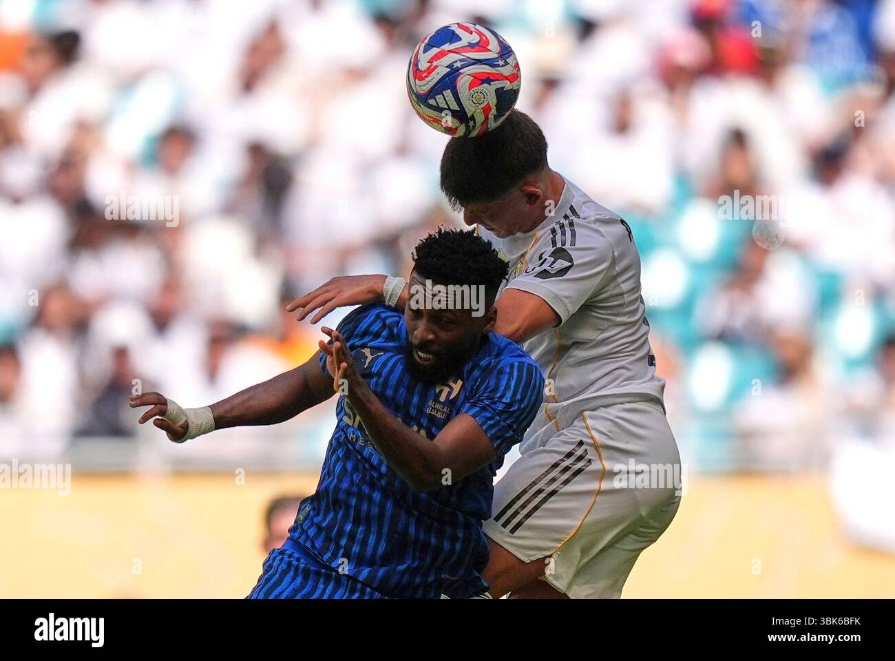 Real Madrid's Arda Guler and Al-Hilal's Hamad Al-Yami go after the ball ...
