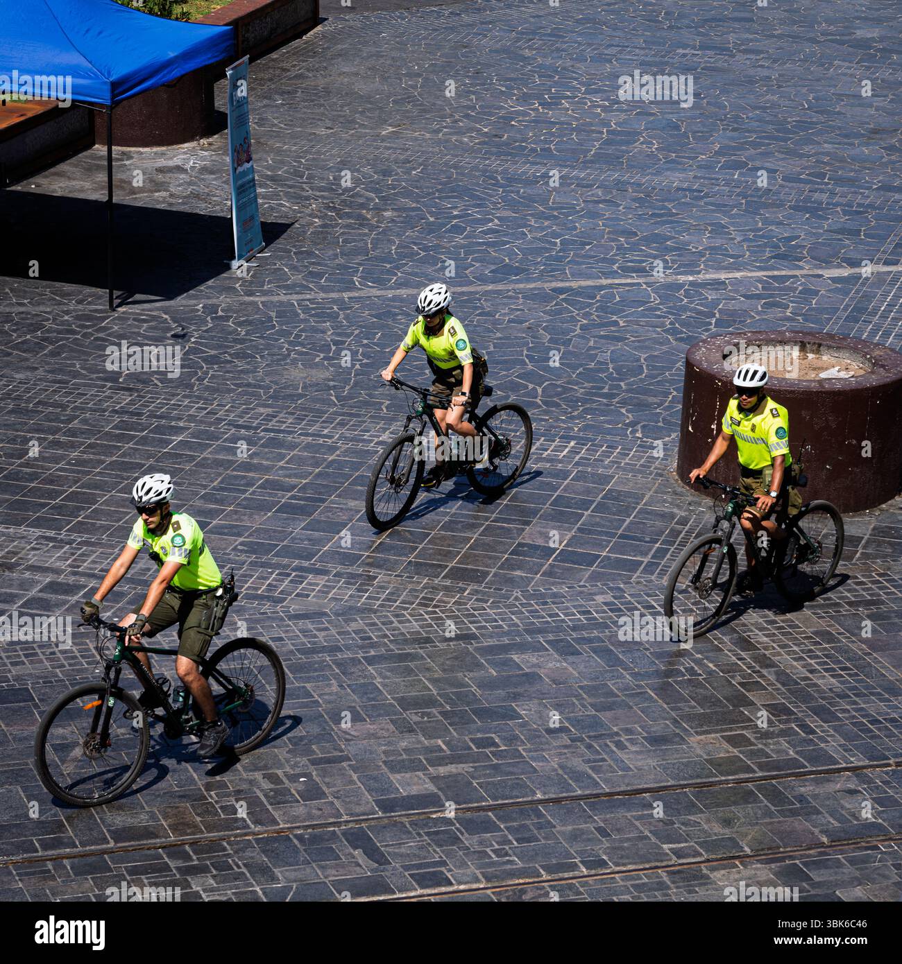 Iquique, Chile—January 29, 2025. Three uniformed police officers ...