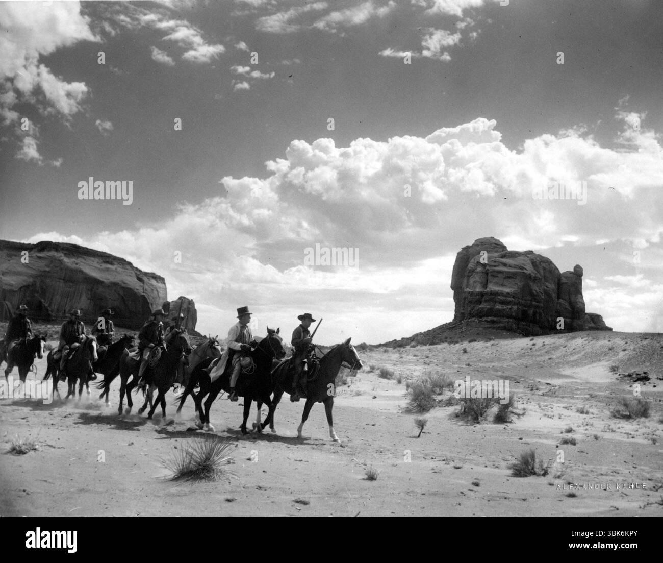 The Searchers (1956) John Wayne as Ethan Edwards Ward Bond as Rev. Capt. Samuel Johnston Clayton ...