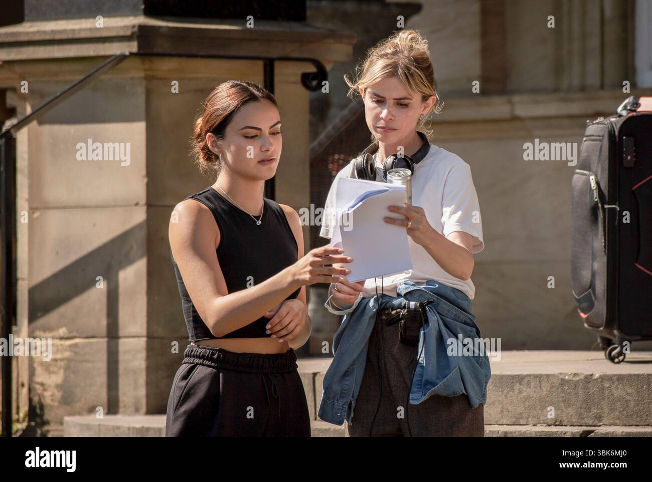 Upgraded (2024) Camila Mendes Director Carlson Young on set of ...