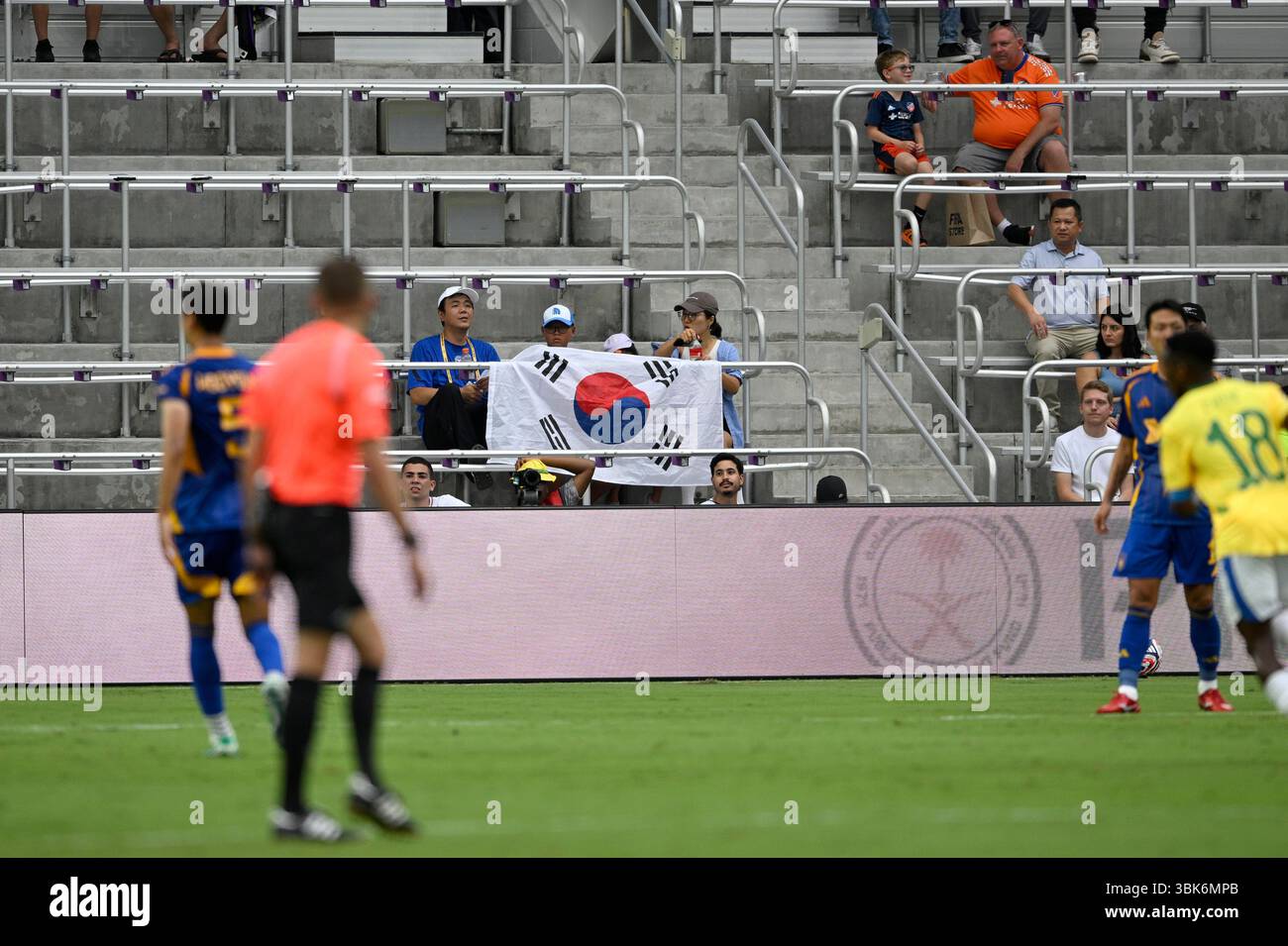 Spectators display a flag of South Korea during the Club World Cup ...