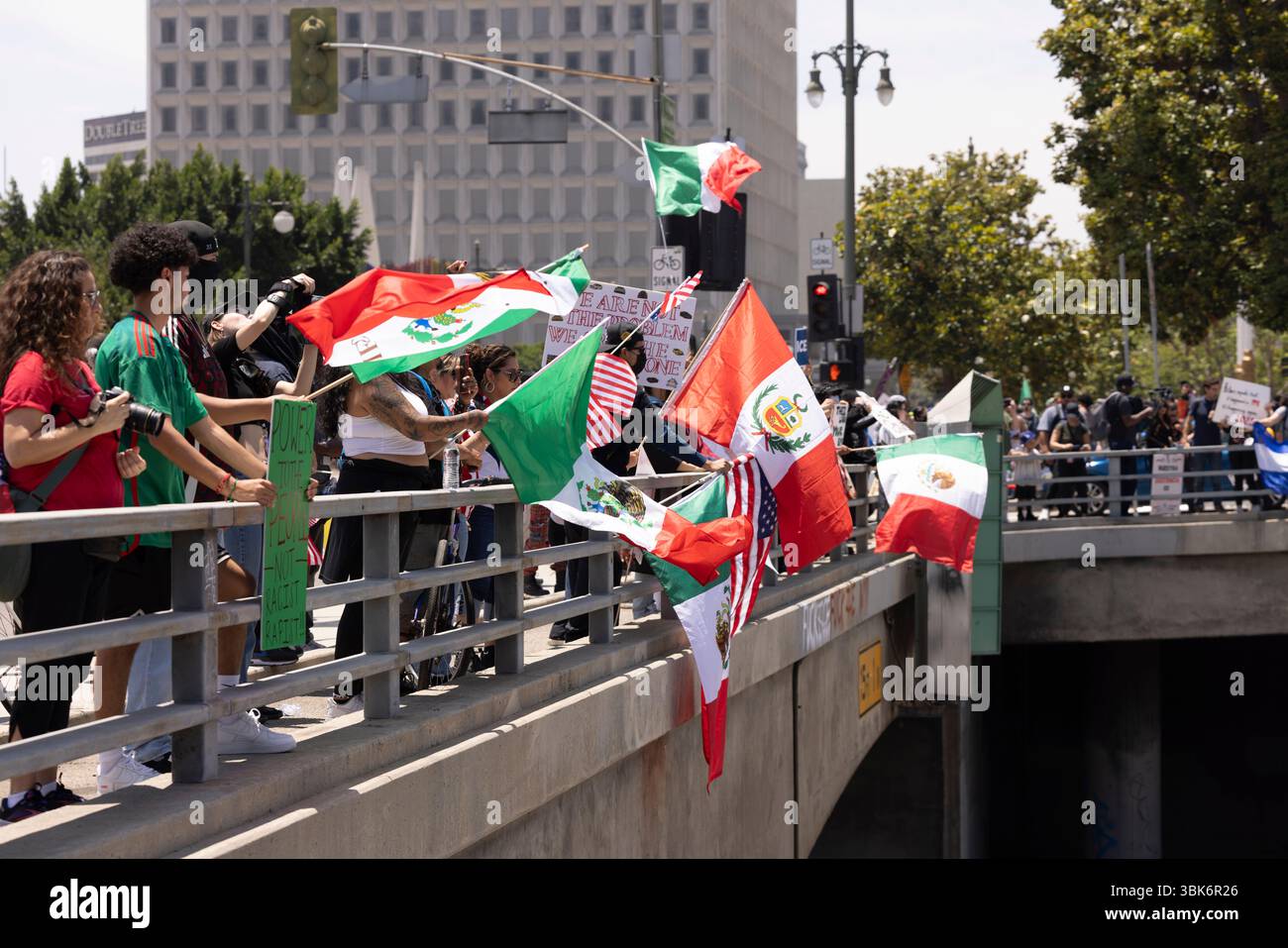 Los Angeles, California, USA - June 14, 2025: People wave Mexican Flags ...