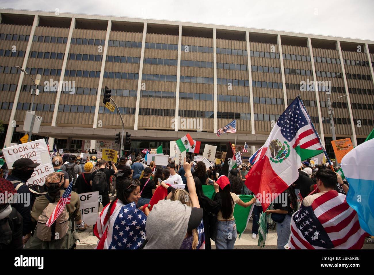 Los Angeles, California, USA - June 14, 2025: People wave Mexican Flags ...