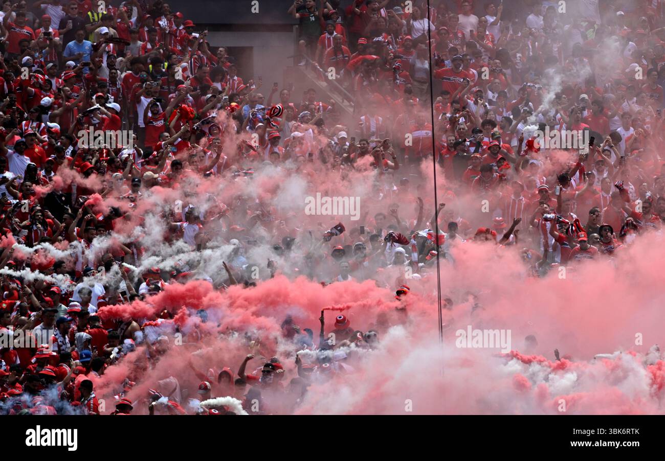 PHILADELPHIA, PENNSYLVANIA - JUNE 18: Wydad AC fans set of flares ...