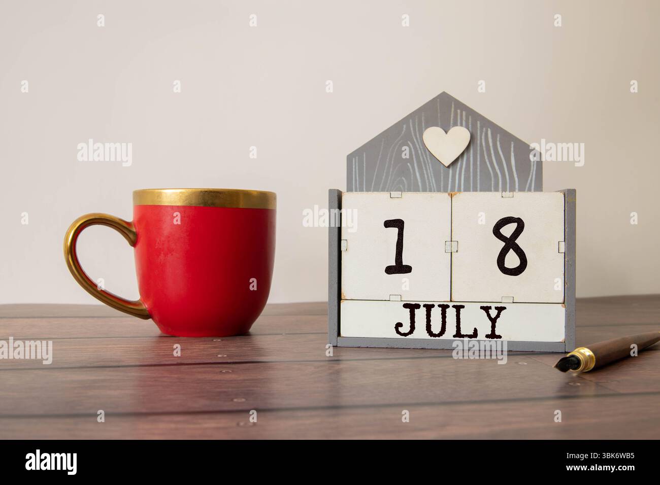 18 July text with blackboard background for calendar. And July is the ...