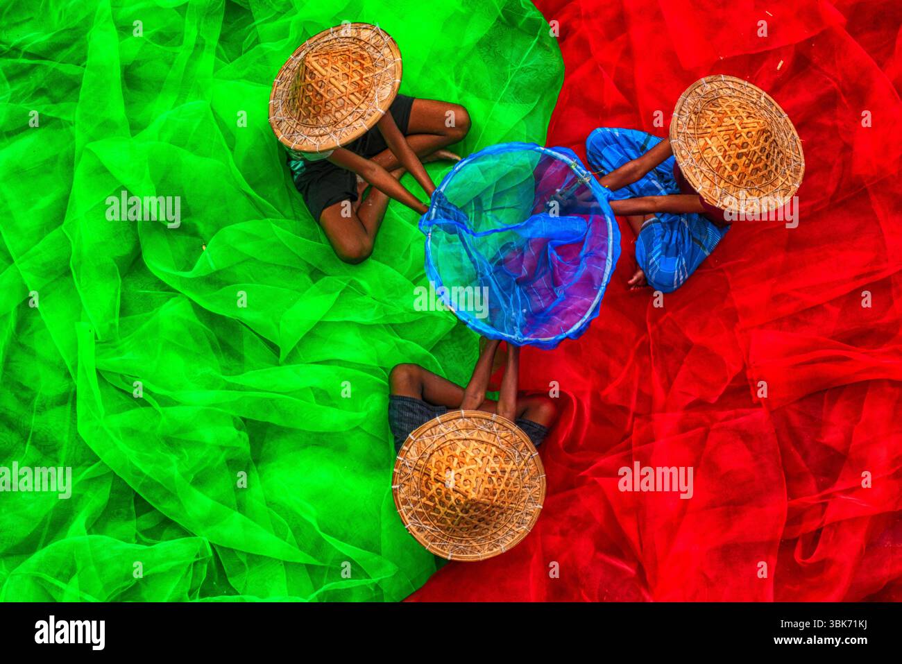 Fishermen seen sorting blue fishing nets in the Sundarbans before their ...