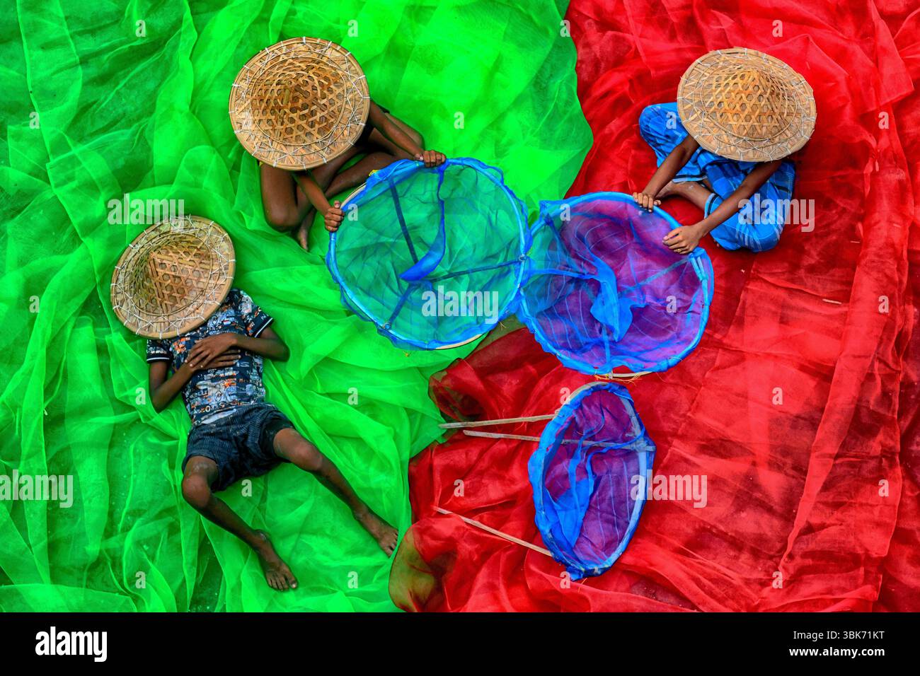 Fishermen seen sorting blue fishing nets in the Sundarbans before their ...