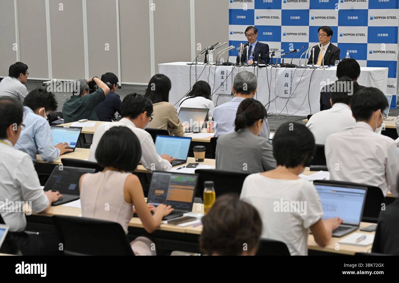 Eiji HASHIMOTO, CEO of Nippon Steel Corporation (L), and Takahiro MORI ...
