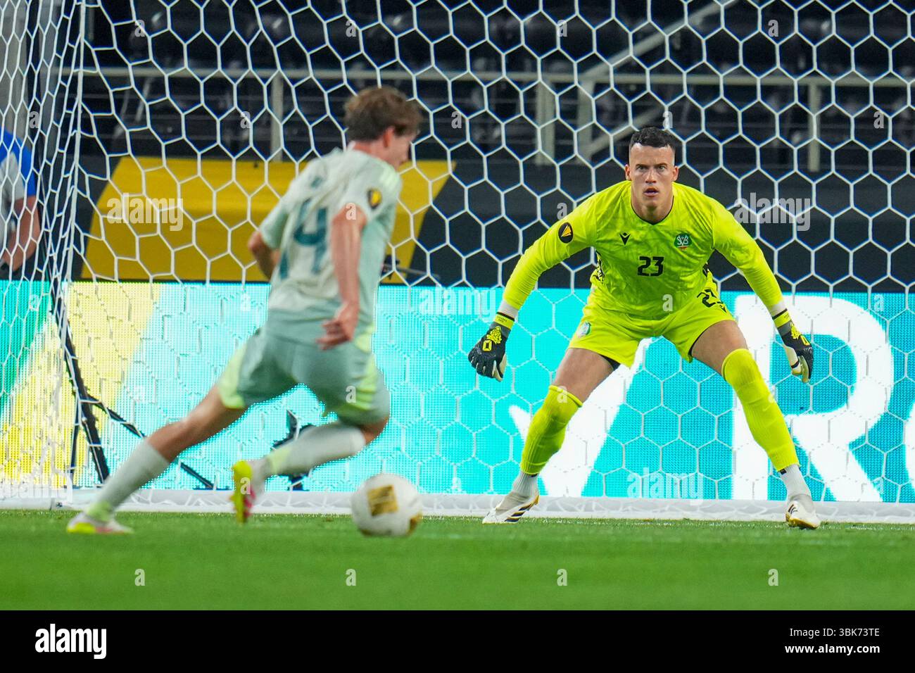 Mexico forward Marcel Ruiz (14) attacks against Suriname goalkeeper ...
