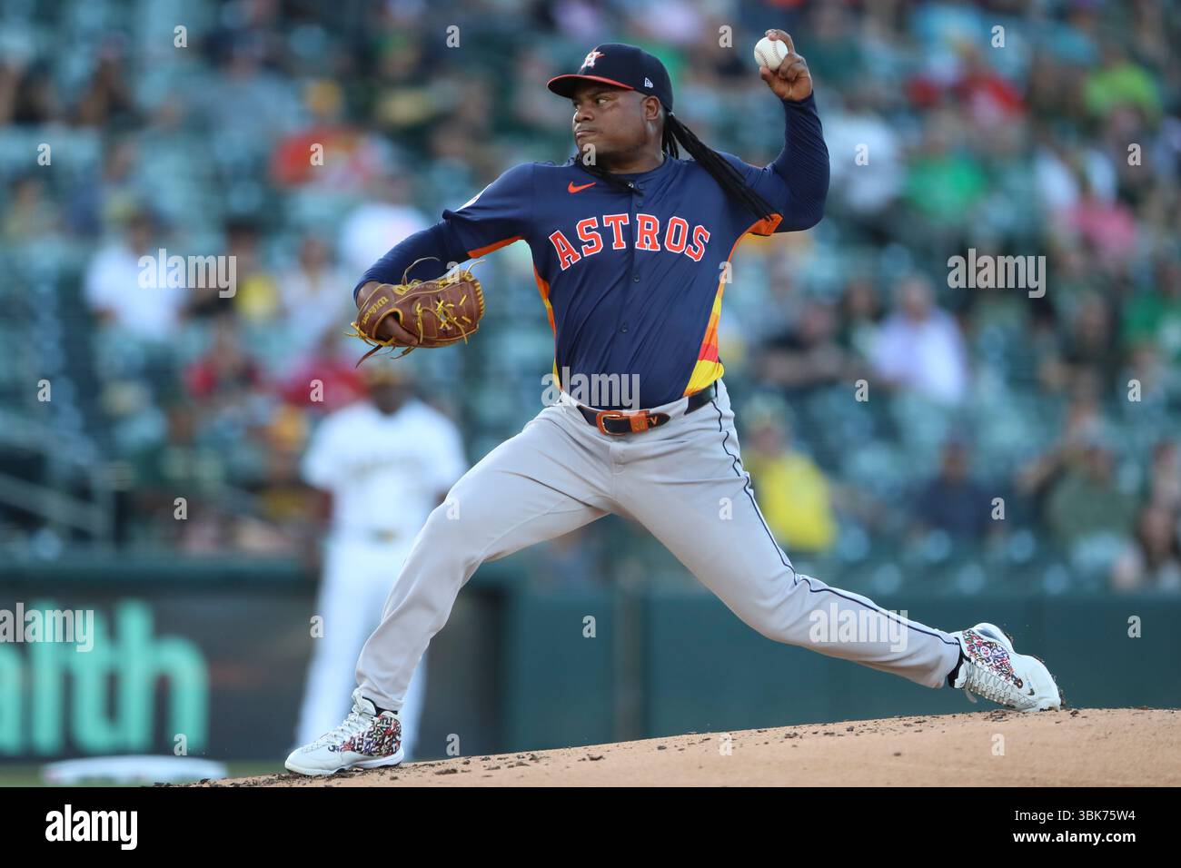 Houston Astros pitcher Framber Valdez pitches to an Athletics batter during the first inning of ...