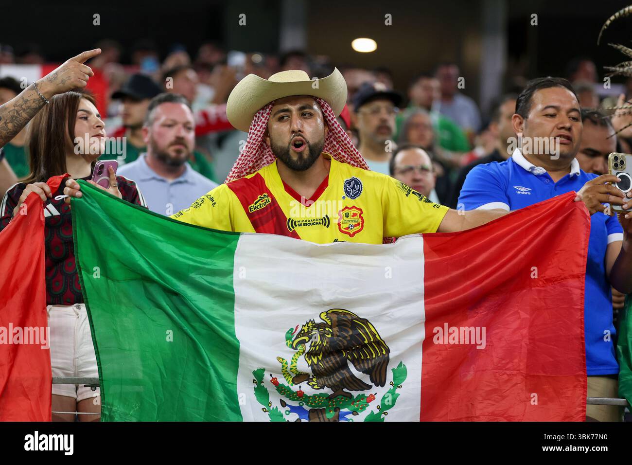 ARLINGTON, TX - JUNE 18: A Mexico fan in the stands before the Concacaf ...