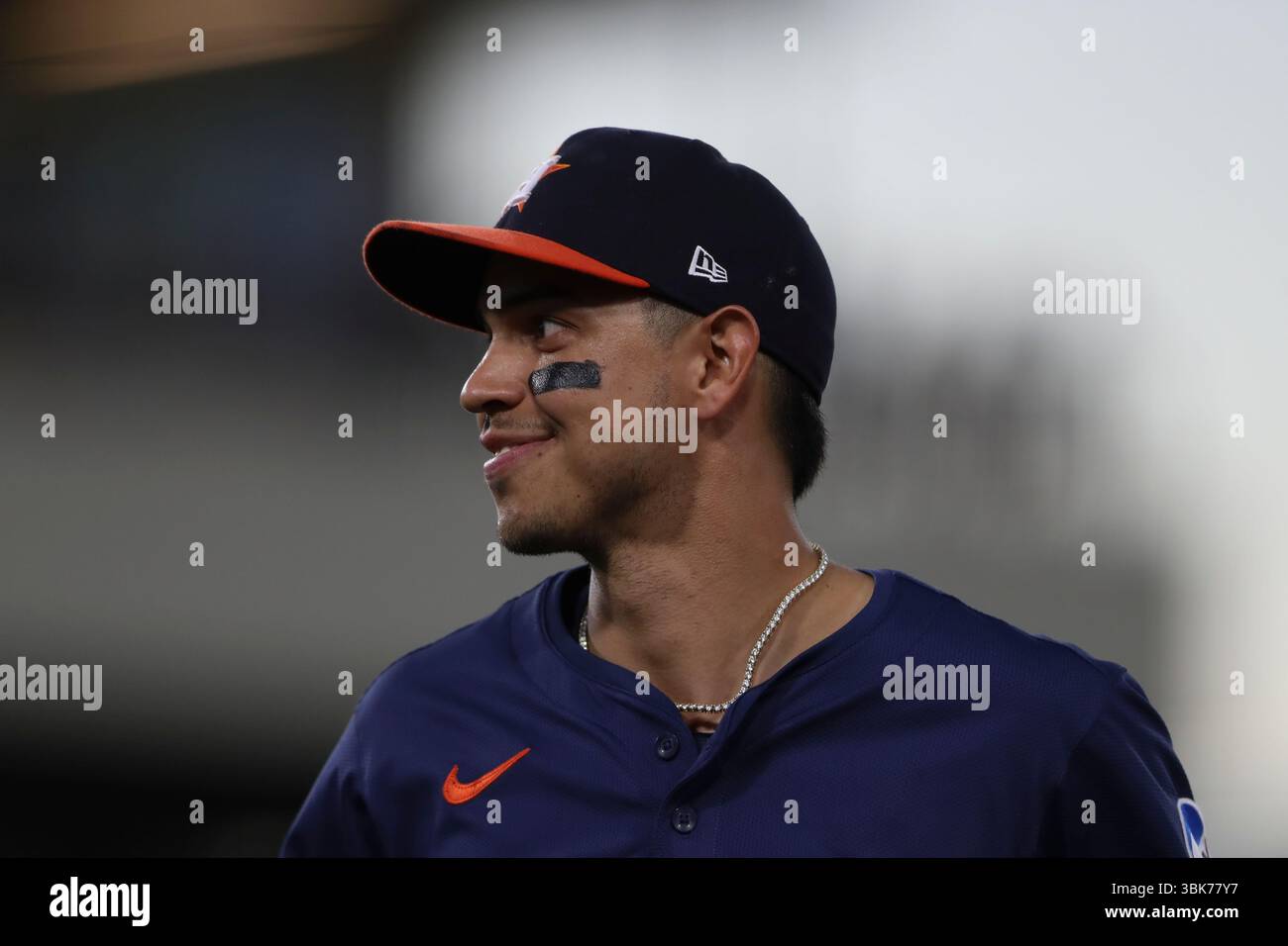 Houston Astros second baseman Mauricio Dubón smiles after turning a ...