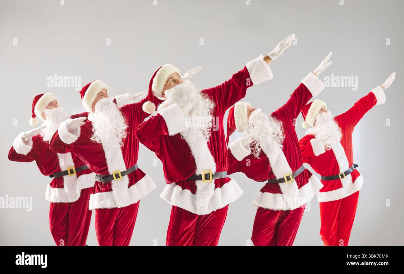 Happy New Year cute group dab dancing, partying wearing Santa Claus ...