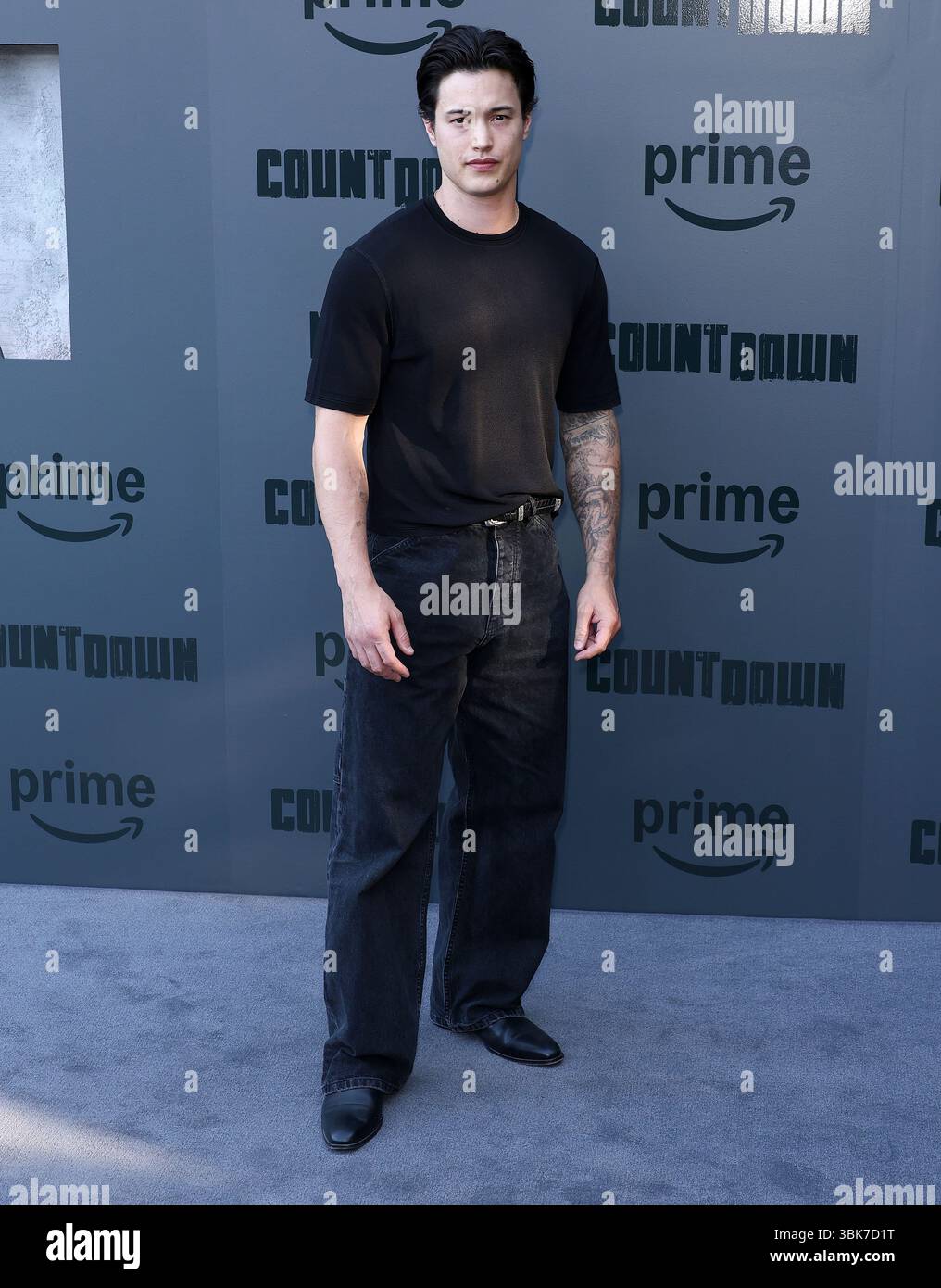 Derek Luh arrives at The Countdown Premiere held at The Harmony Gold ...
