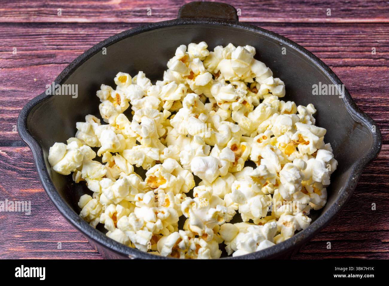 Cooking popcorn in frying pan hi-res stock photography and images - Alamy