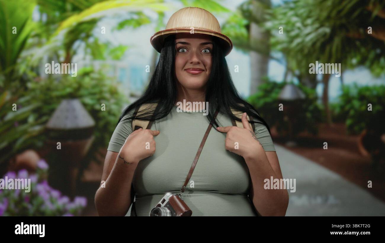 Woman tourist surprised expression points hi-res stock photography and ...
