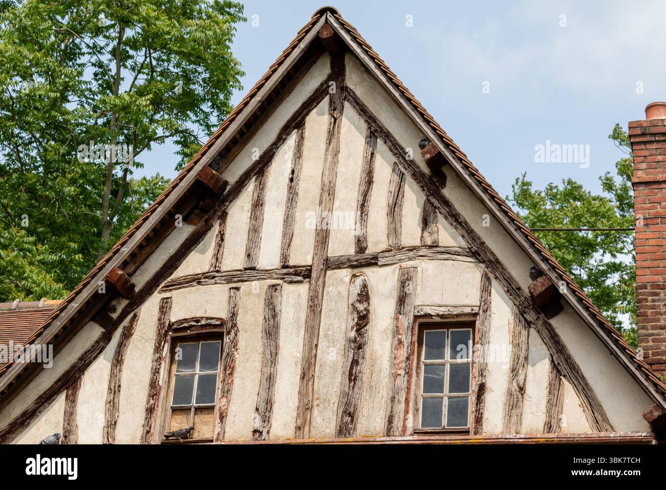 Close-up of a building's gable end, showcasing half-timbered ...