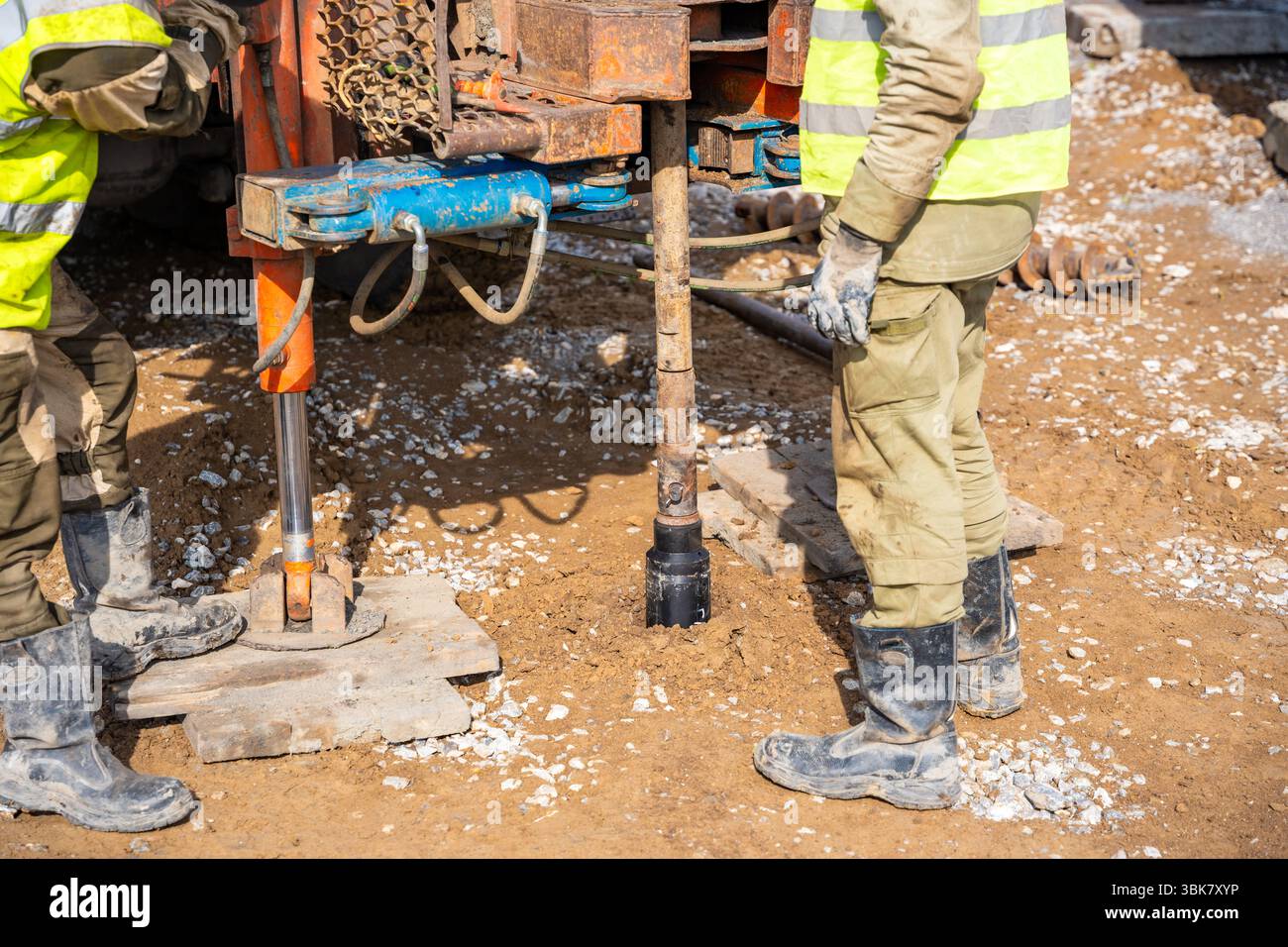 Close-up of soil sampling during pile drilling process. Extraction of ...