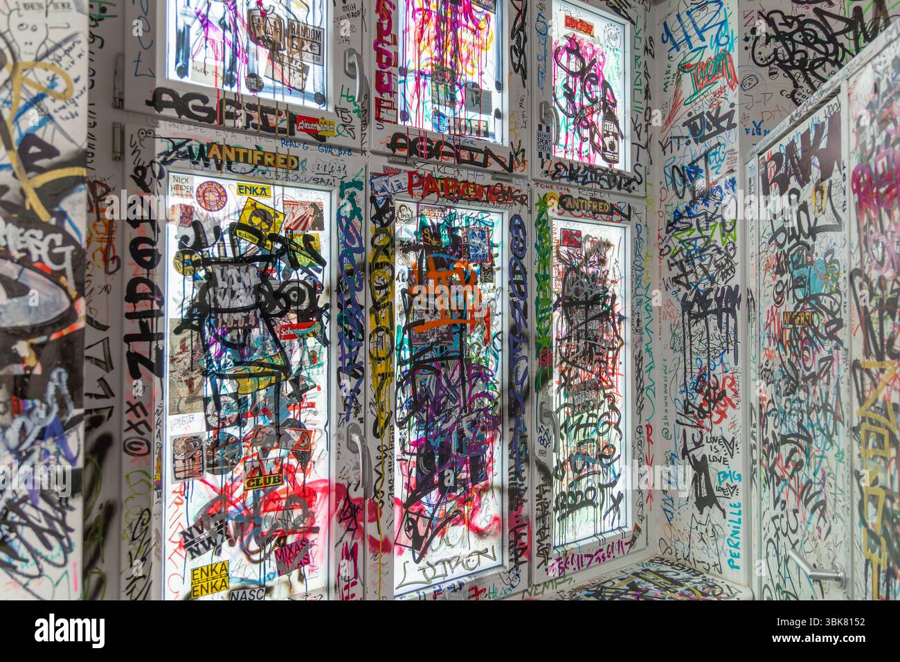 Urban Nation Museum: An interior corner completely covered in vibrant ...