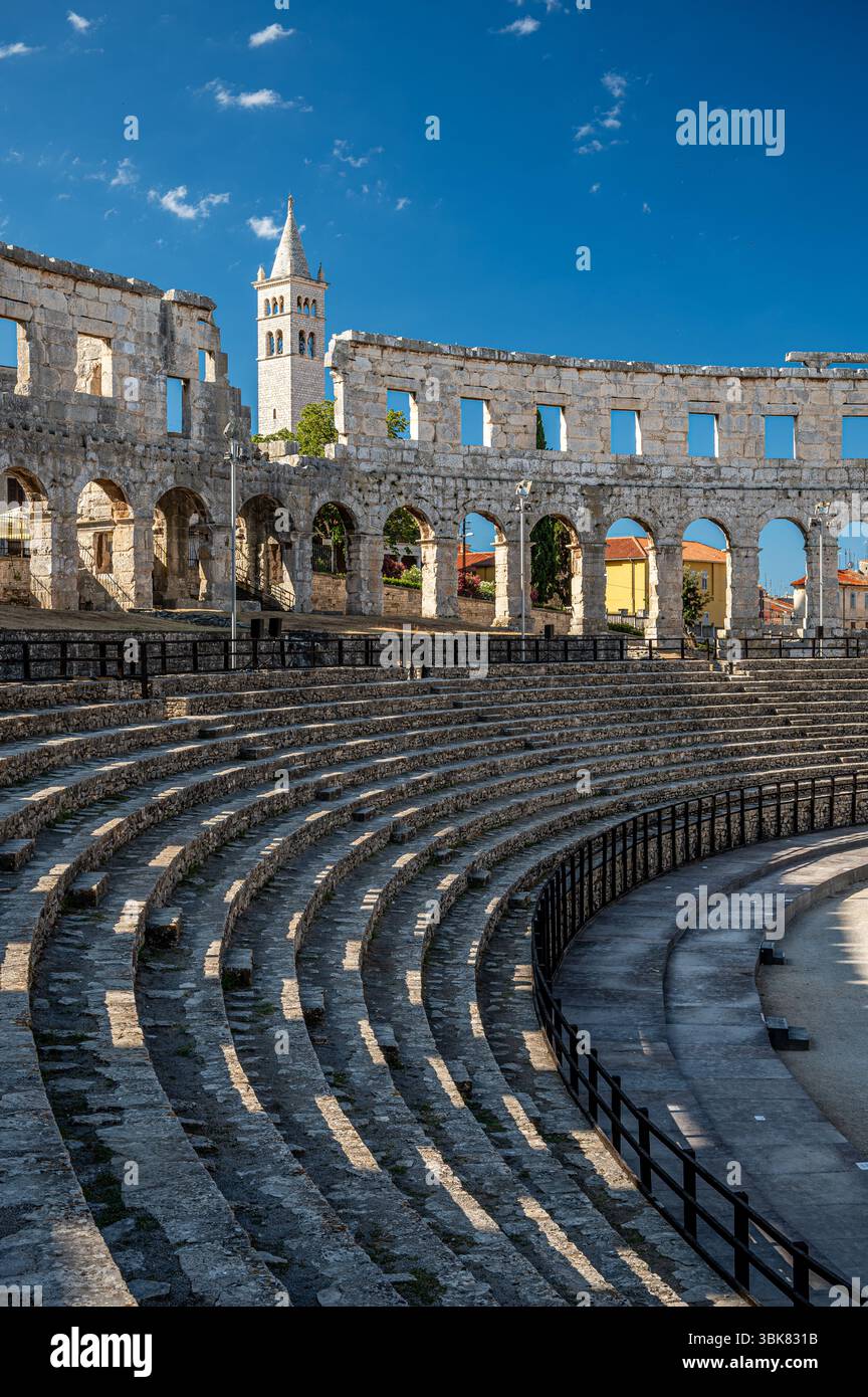 Majestic Roman Amphitheater of Pula with Church Tower Stock Photo - Alamy