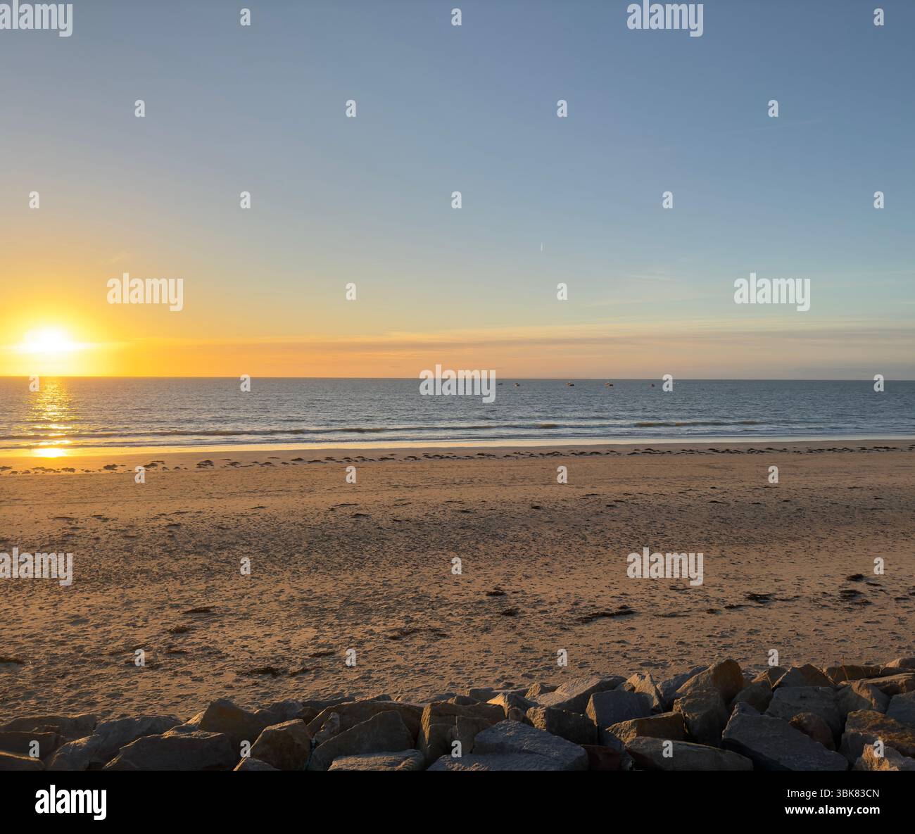 Sunset on a beach in Normandy, France Stock Photo - Alamy