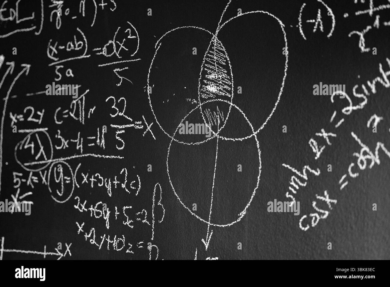 Student writing math equation on Black and White Stock Photos & Images ...