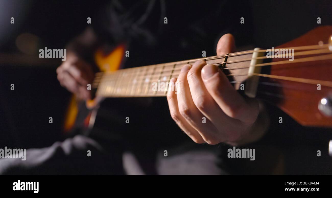 Musicians hand playing chord hi-res stock photography and images - Alamy