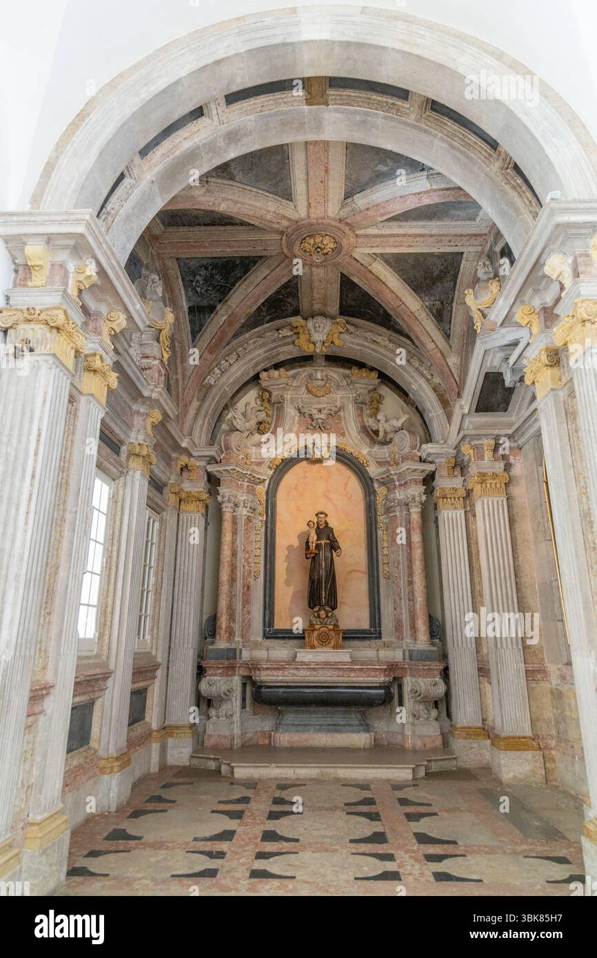 Baroque-style chapel interior with statue of Saint Anthony, featuring ...