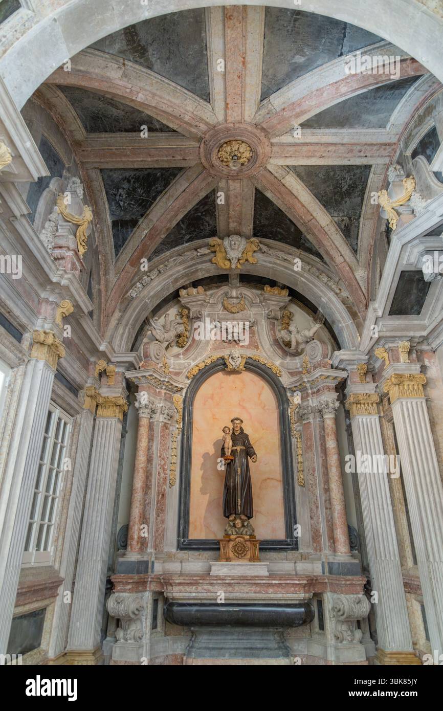 Baroque-style chapel interior with statue of Saint Anthony, featuring ...