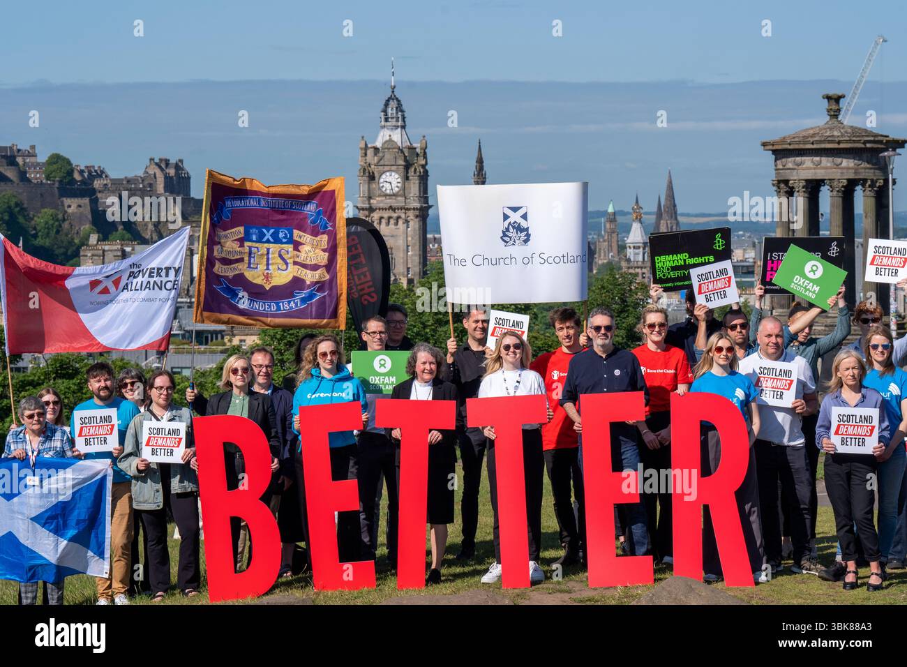 Campaigners from the Poverty Alliance gather on Calton Hill in ...