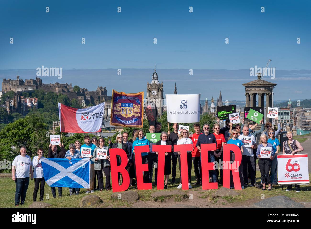 Campaigners from the Poverty Alliance gather on Calton Hill in ...