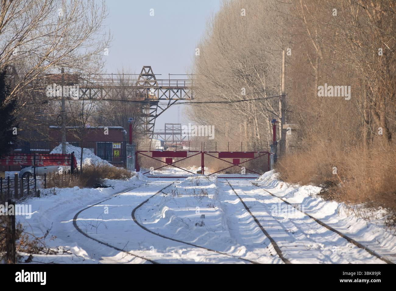 A railway track covered in snow leading into the Unit 731 Prison Camp ...