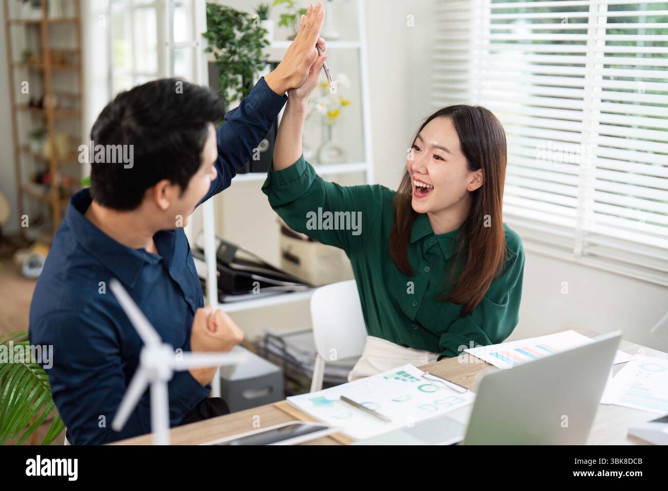 Business team celebrating achieving goals hi-res stock photography and ...