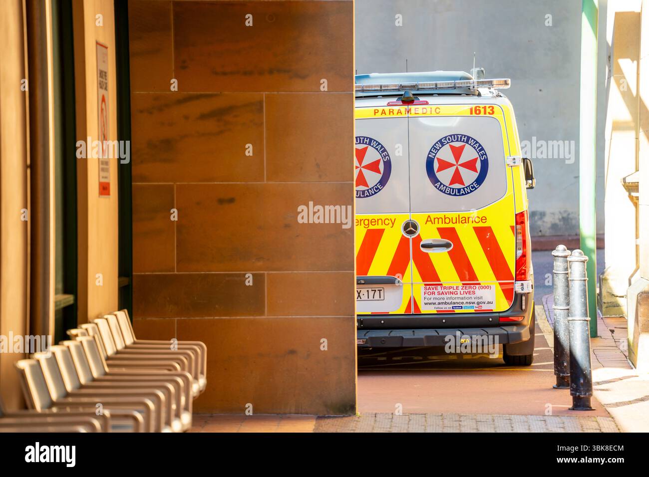 The rear view of a New South Wales ambulance parked beside Sydney ...