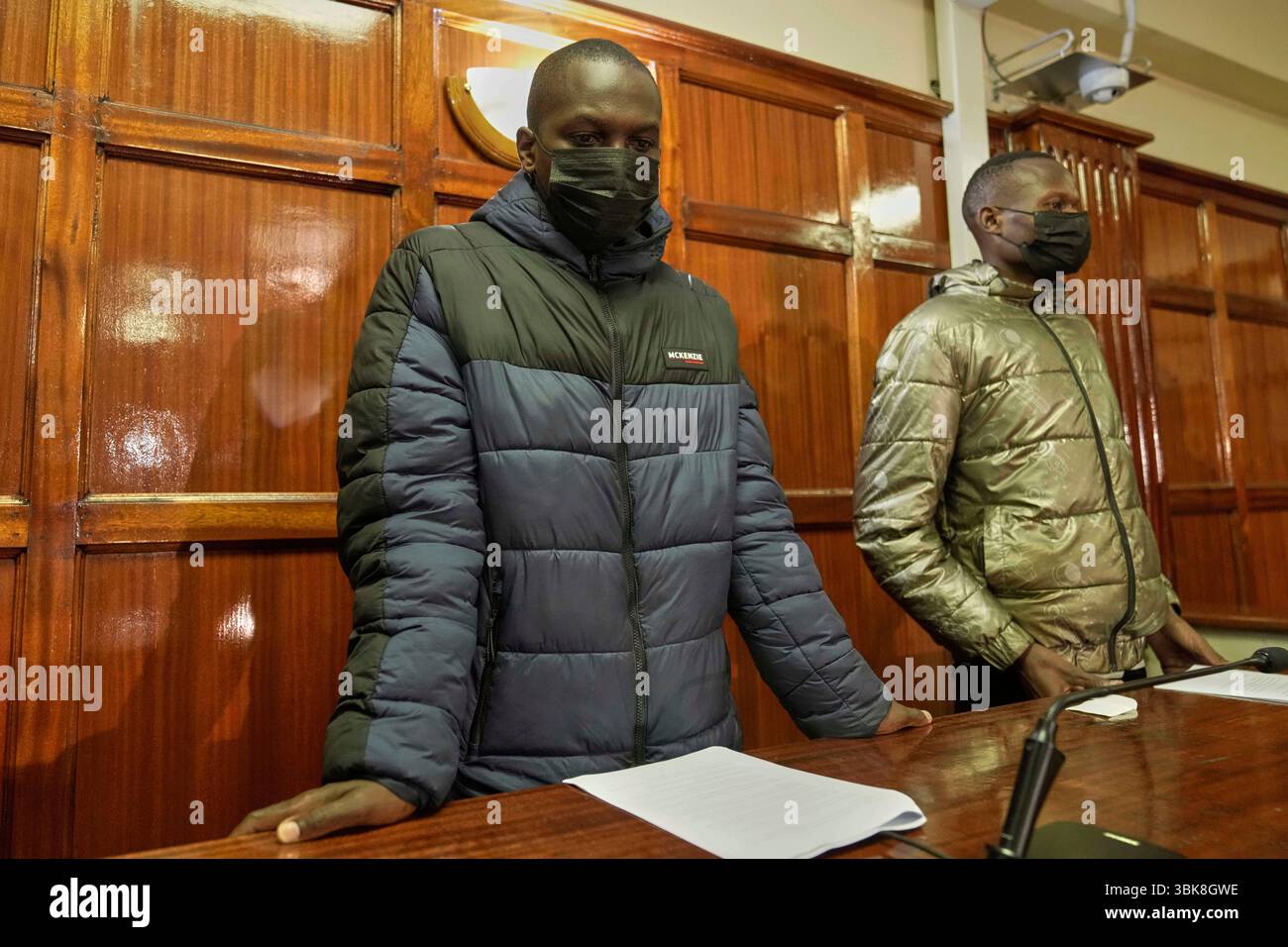 Kenya police officers Duncan Kiprono, left, and Klinzy Barasa, right ...