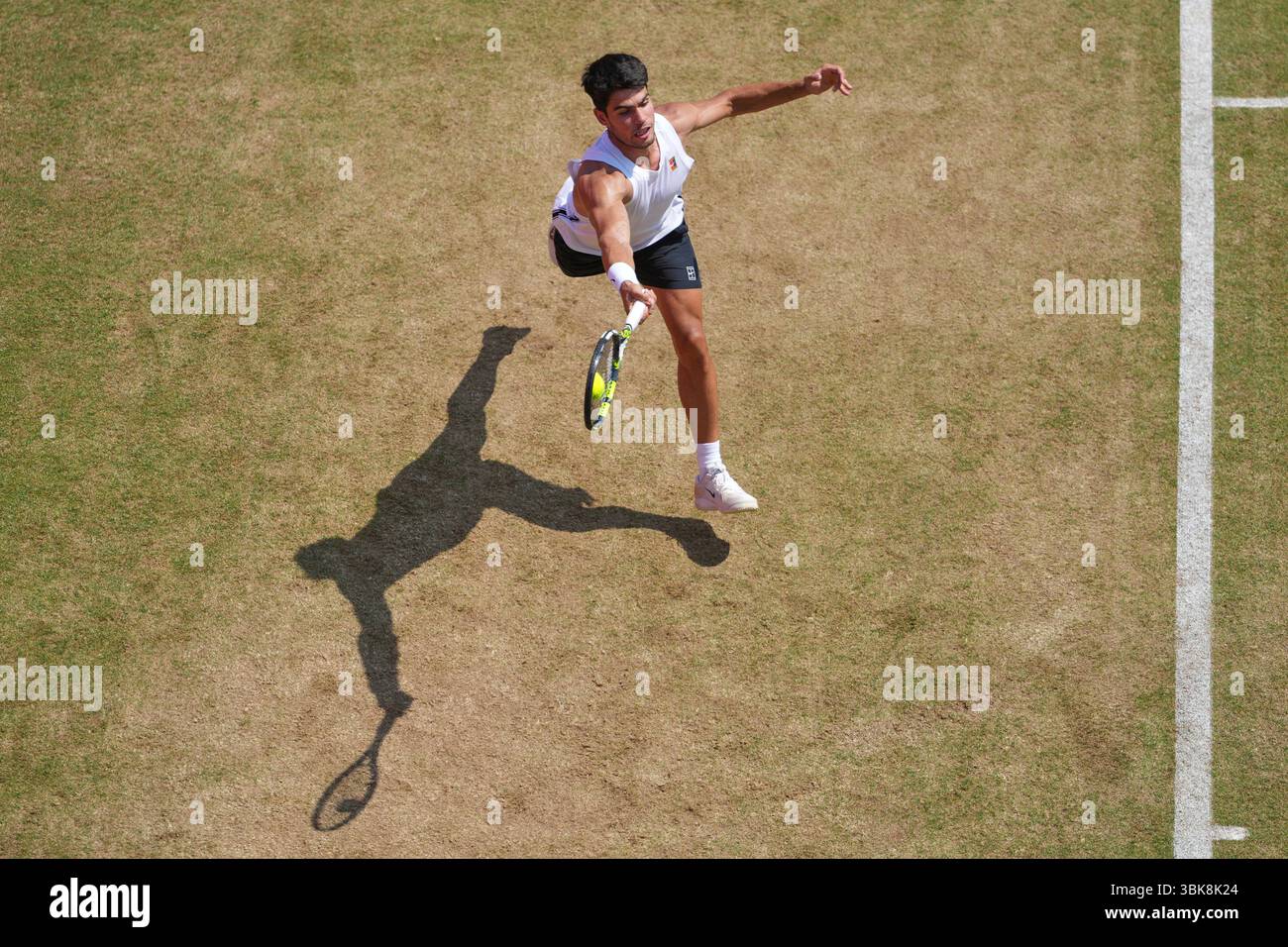 Carlos Alcaraz of Spain plays a return during a training session at the ...