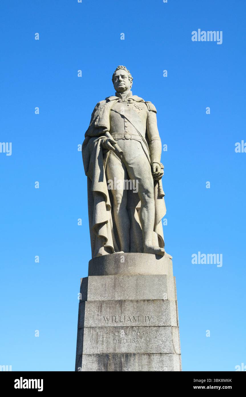 Granite statue of King William IV (1765-1837) on a plinth in Greenwich ...