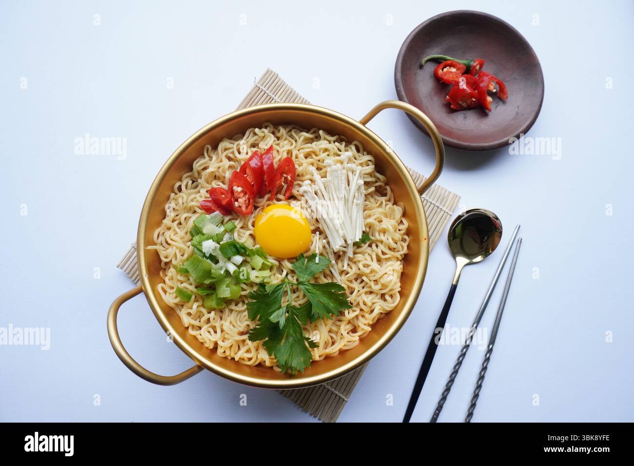Ramyeon or Ramyun is Korean instant noodle, with spicy flavour topped ...
