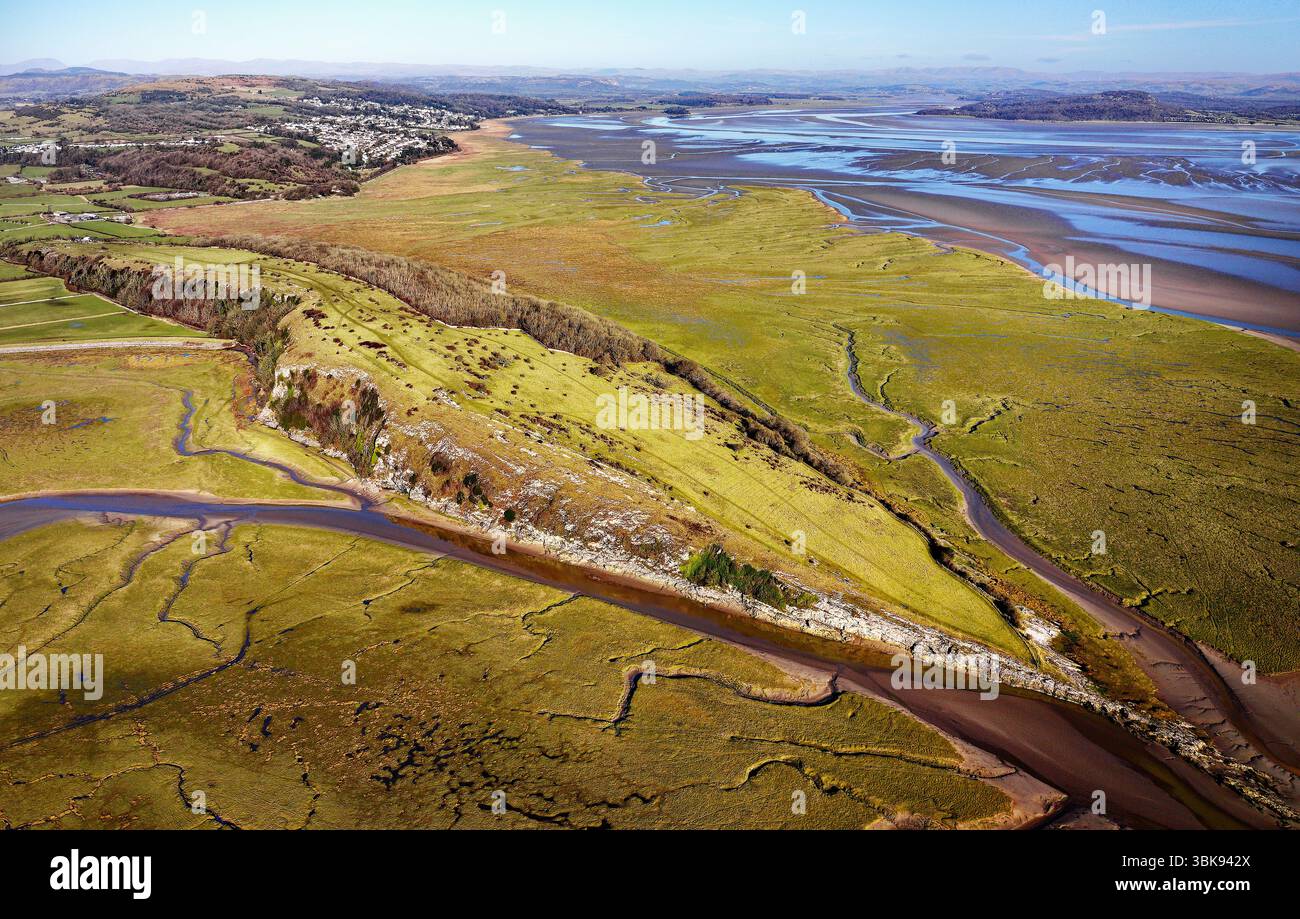 NE over Humphrey Head limestone outcrop to tidal marsh and mudflats of ...