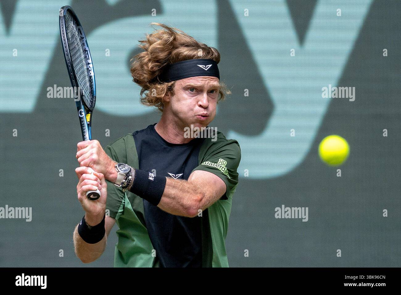 Russia's Andrey Rublev returns the ball to Argentina's Tomas Martin ...