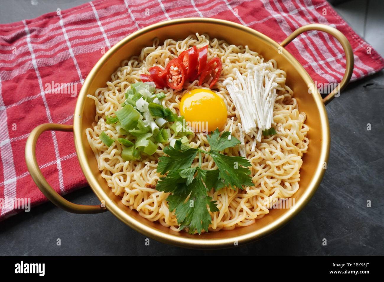 Ramyeon or Ramyun is Korean instant noodle, with spicy flavour topped ...