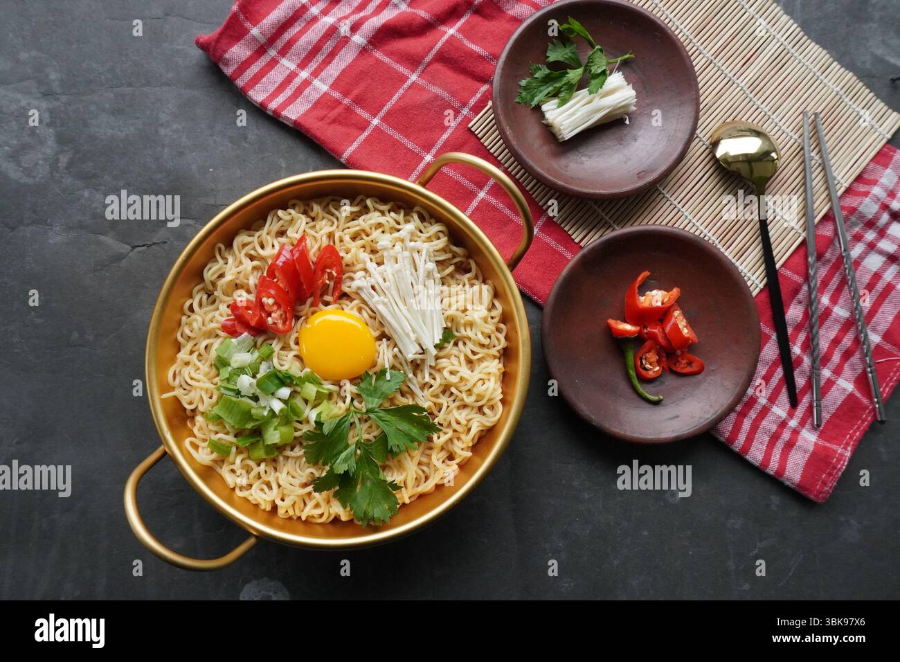 Ramyeon or Ramyun is Korean instant noodle, with spicy flavour topped ...