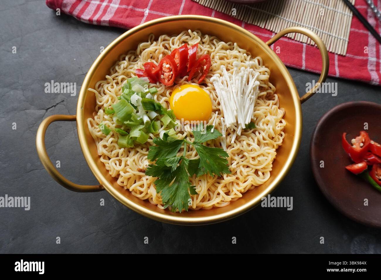 Ramyeon or Ramyun is Korean instant noodle, with spicy flavour topped ...