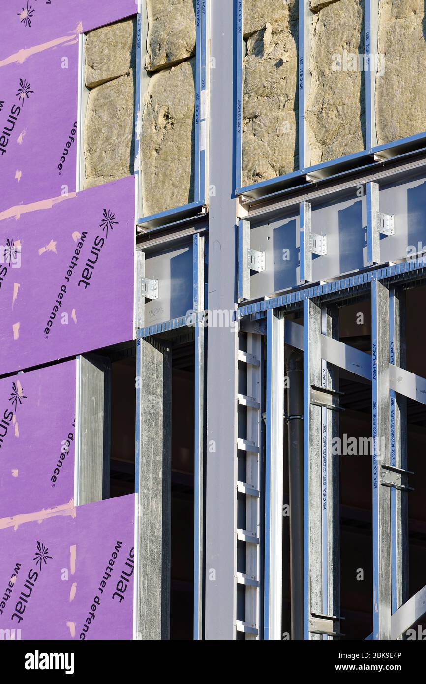 Weather defence backing boards installed on secondary steel frame hi ...