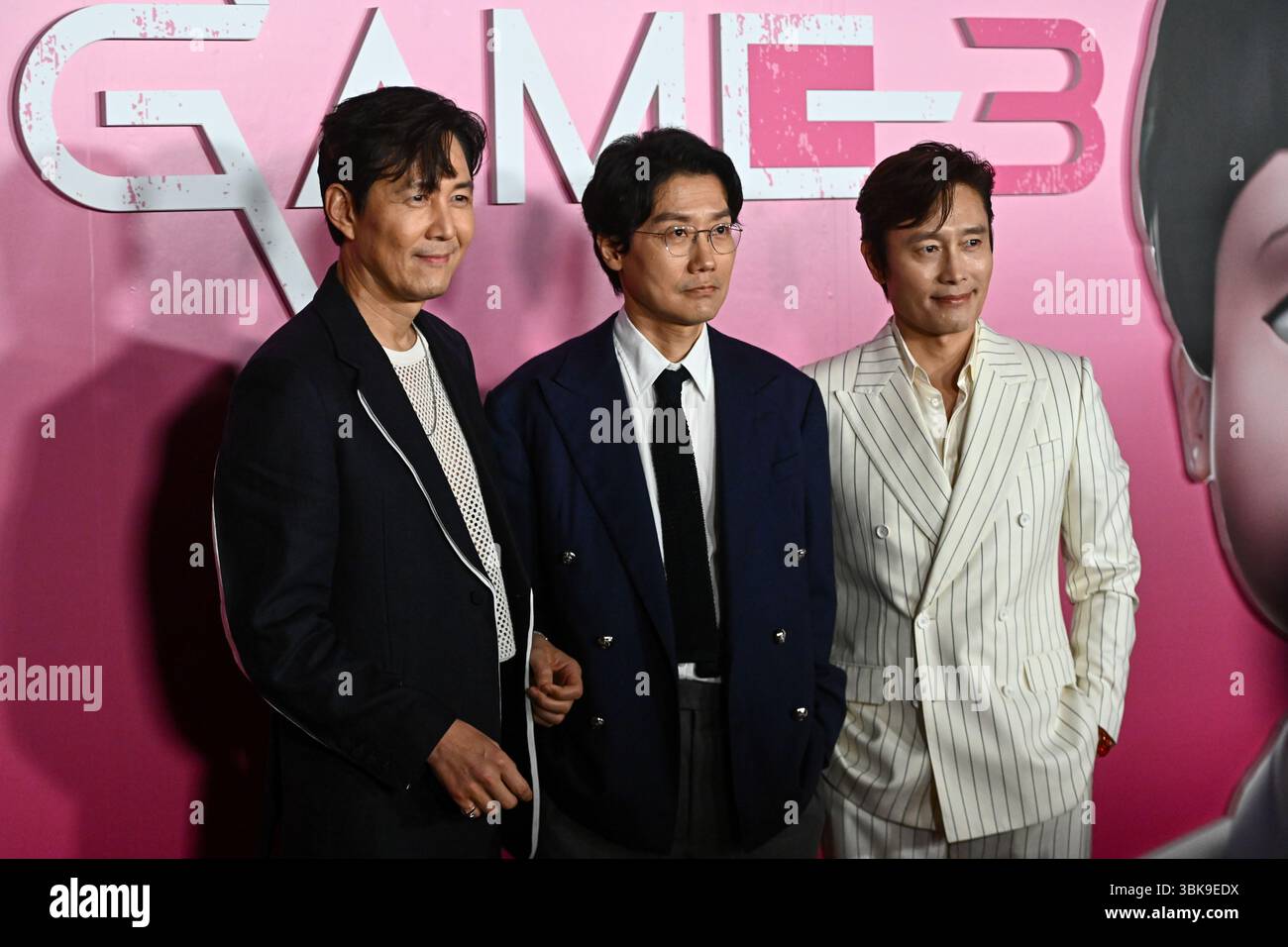 Lee Jung-jae, Hwang Dong-hyuk and Lee Byung-hun Stock Photo - Alamy