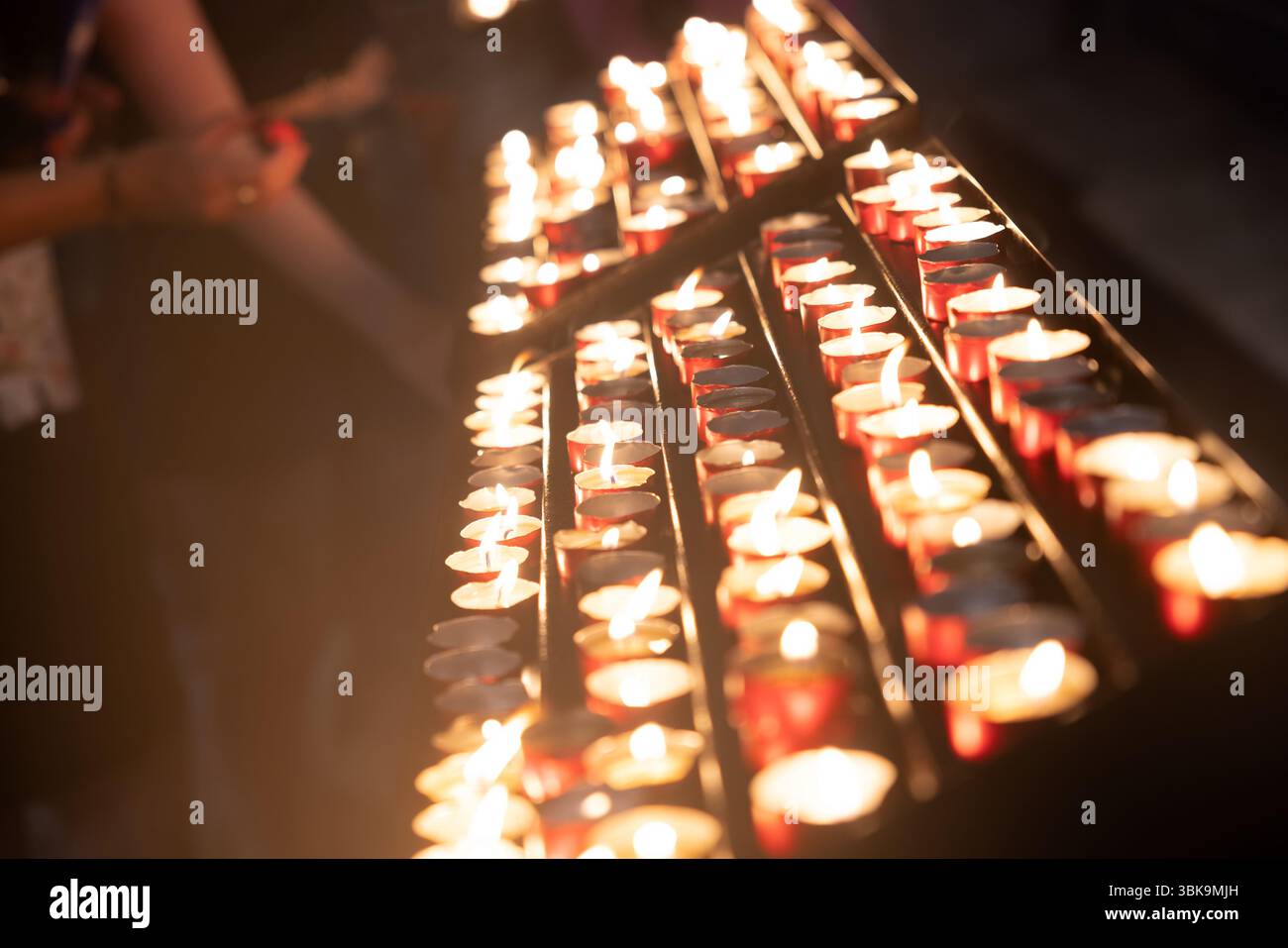 Candles in basilica church hi-res stock photography and images - Alamy