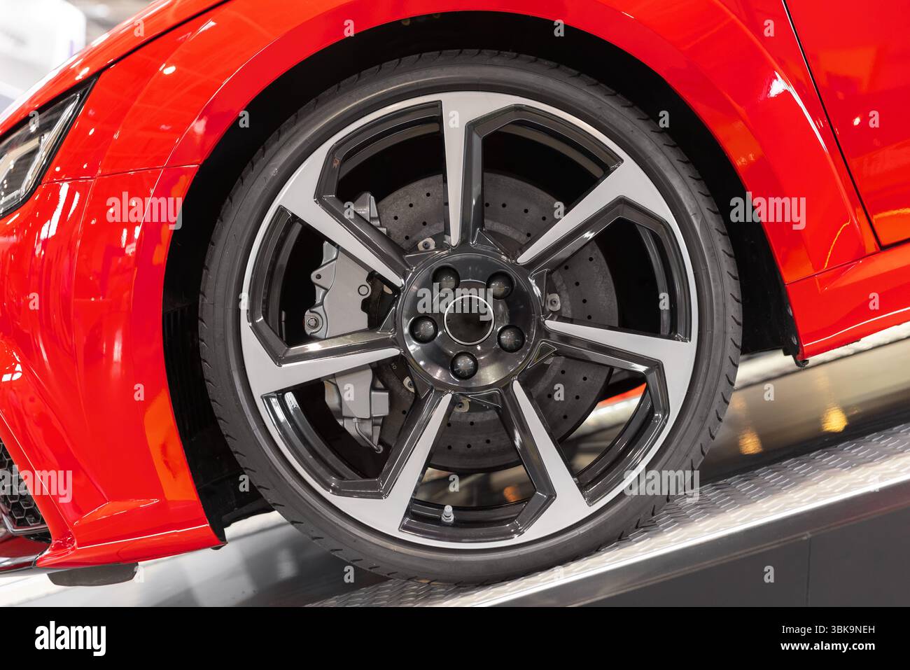 Modern car wheels with new tyre close up photo Stock Photo - Alamy