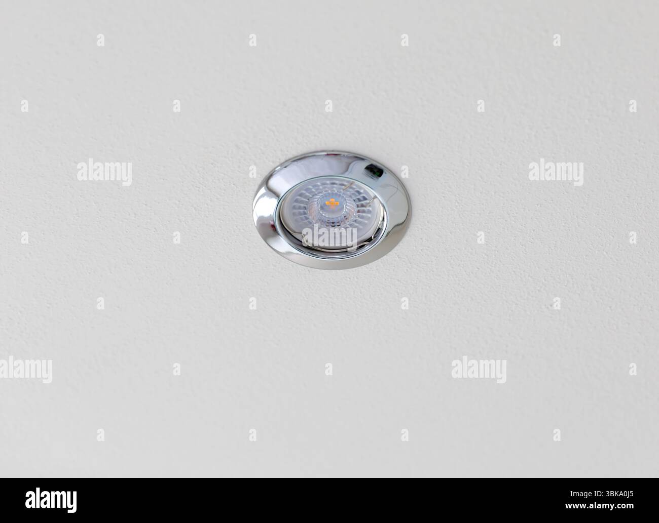 Small LED Spotlight Illuminating A White Ceiling, Producing A Bright ...